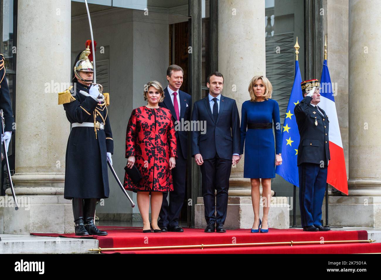 French President Emmanuel Macron (2-R) and his wife Brigitte (R ...