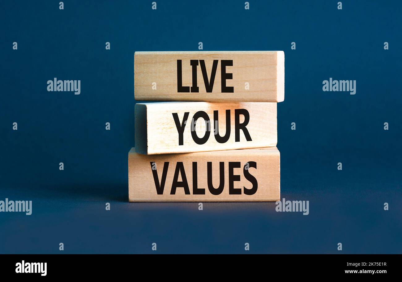 Live your values symbol. Concept words Live your values on wooden ...
