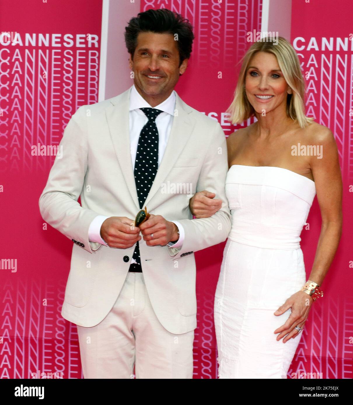 US actor Patrick Dempsey (L) and his wife Jillian Fink (R) arrive for ...