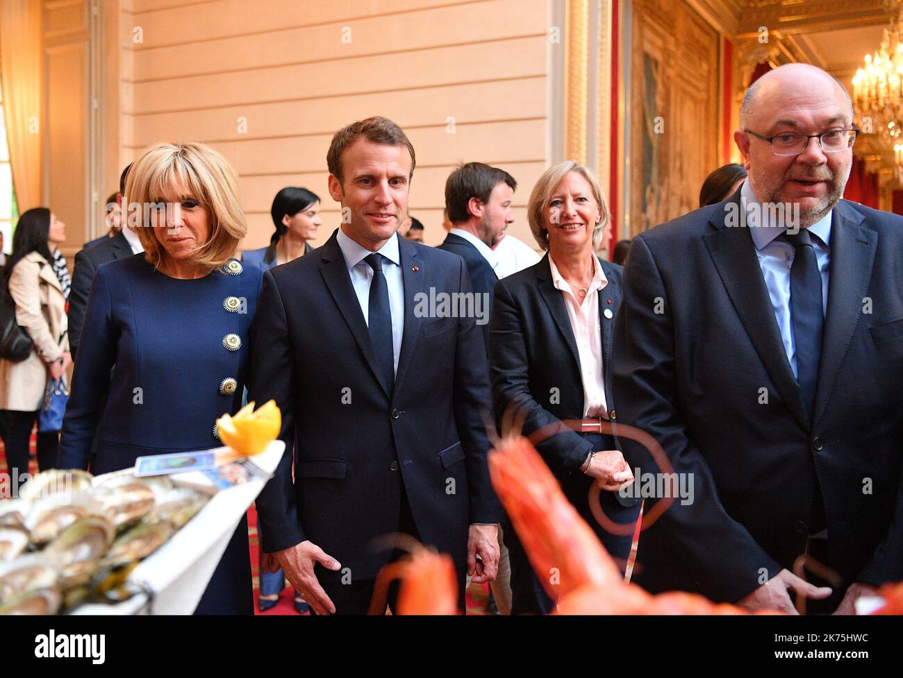 French President Emmanuel Macron and his wife Brigitte Macron and ...