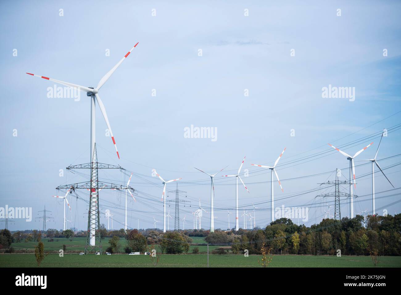 Wind turbines electricity pylons hi-res stock photography and images ...