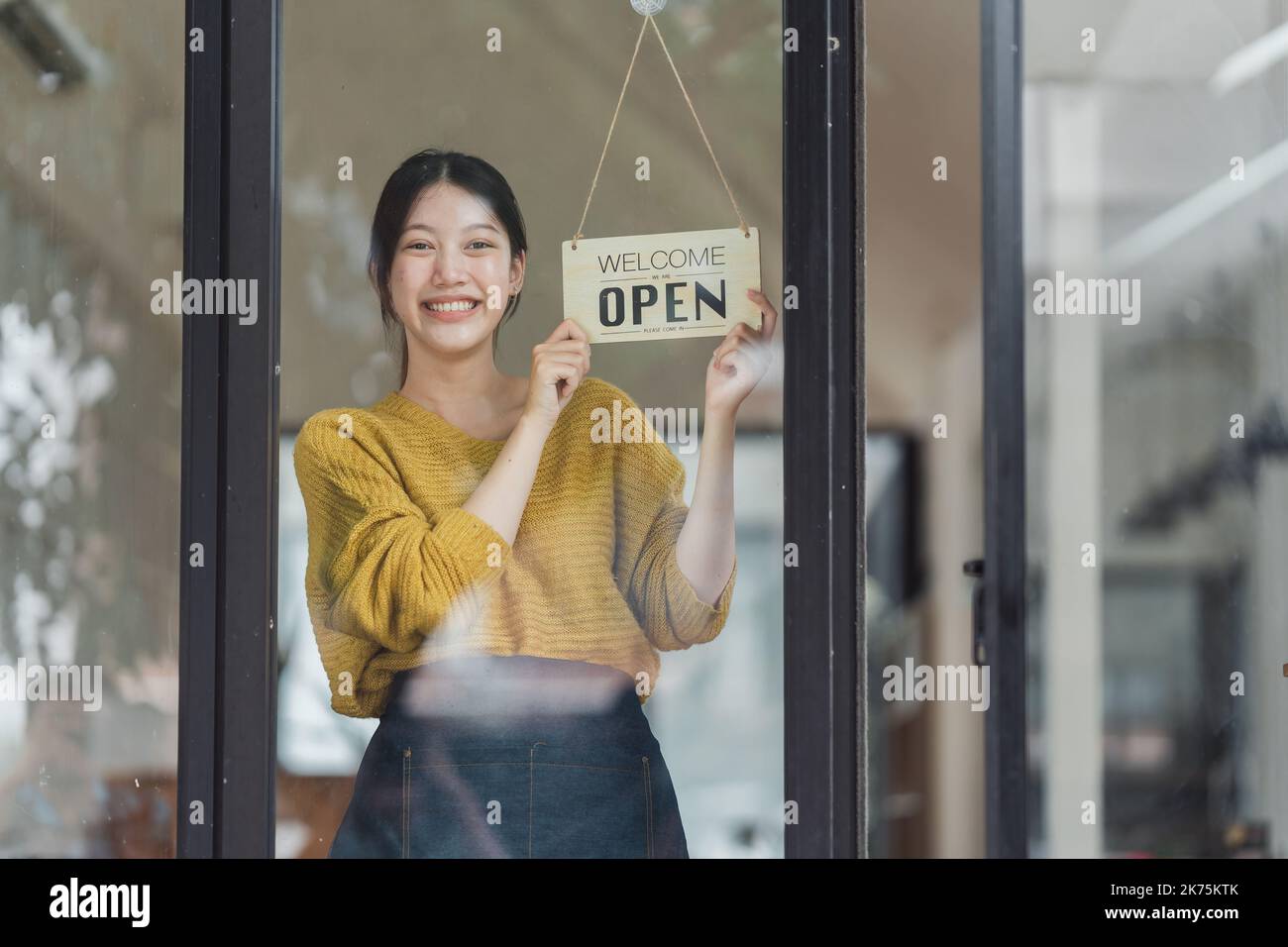 Portrait of Startup successful small business owner in coffee shop. SME ...