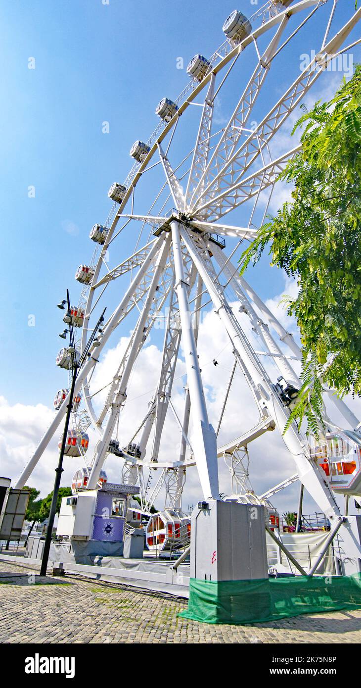 Ferris wheel at a fair in the Barceloneta neighborhood in Barcelona ...