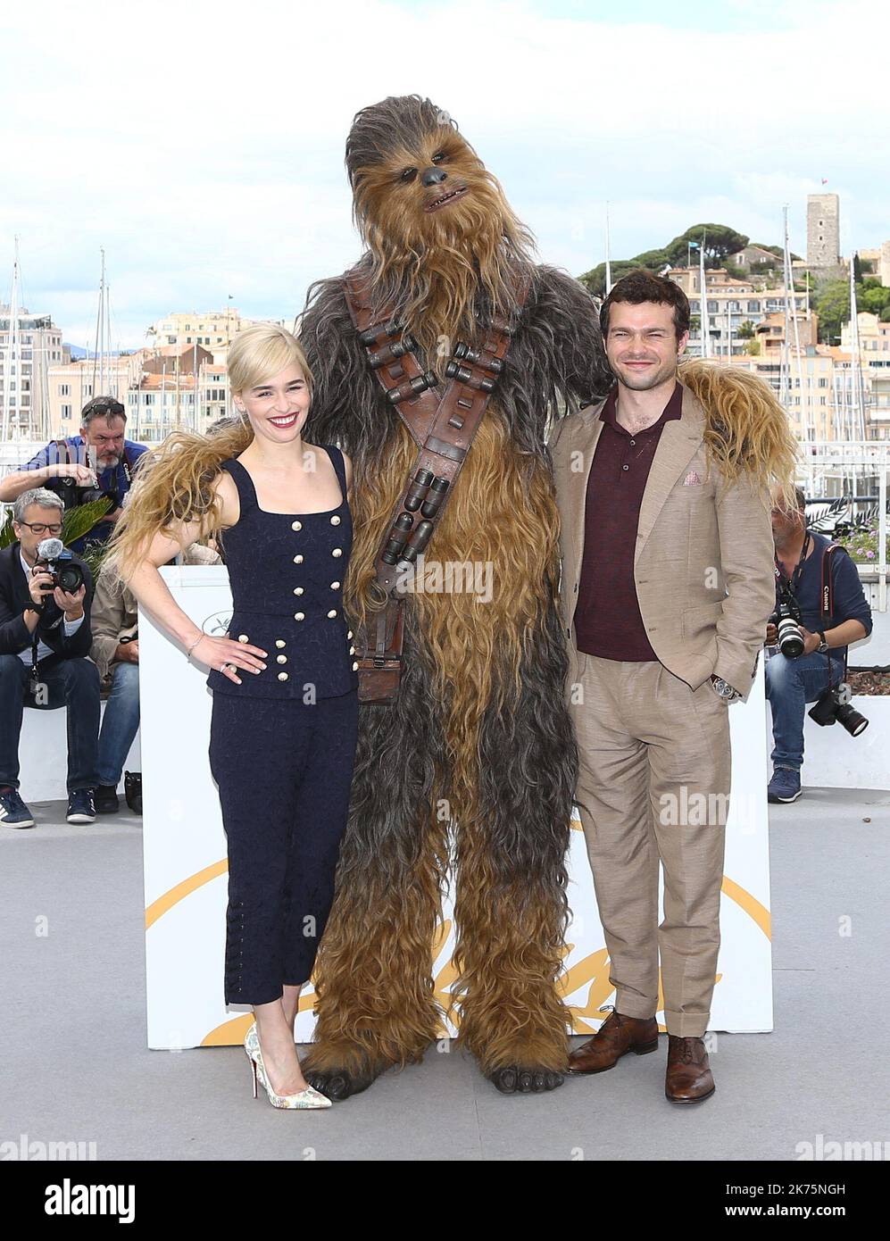 Emilia Clarke, Chewbacca and Alden Ehrenreich attend the photocall for ...
