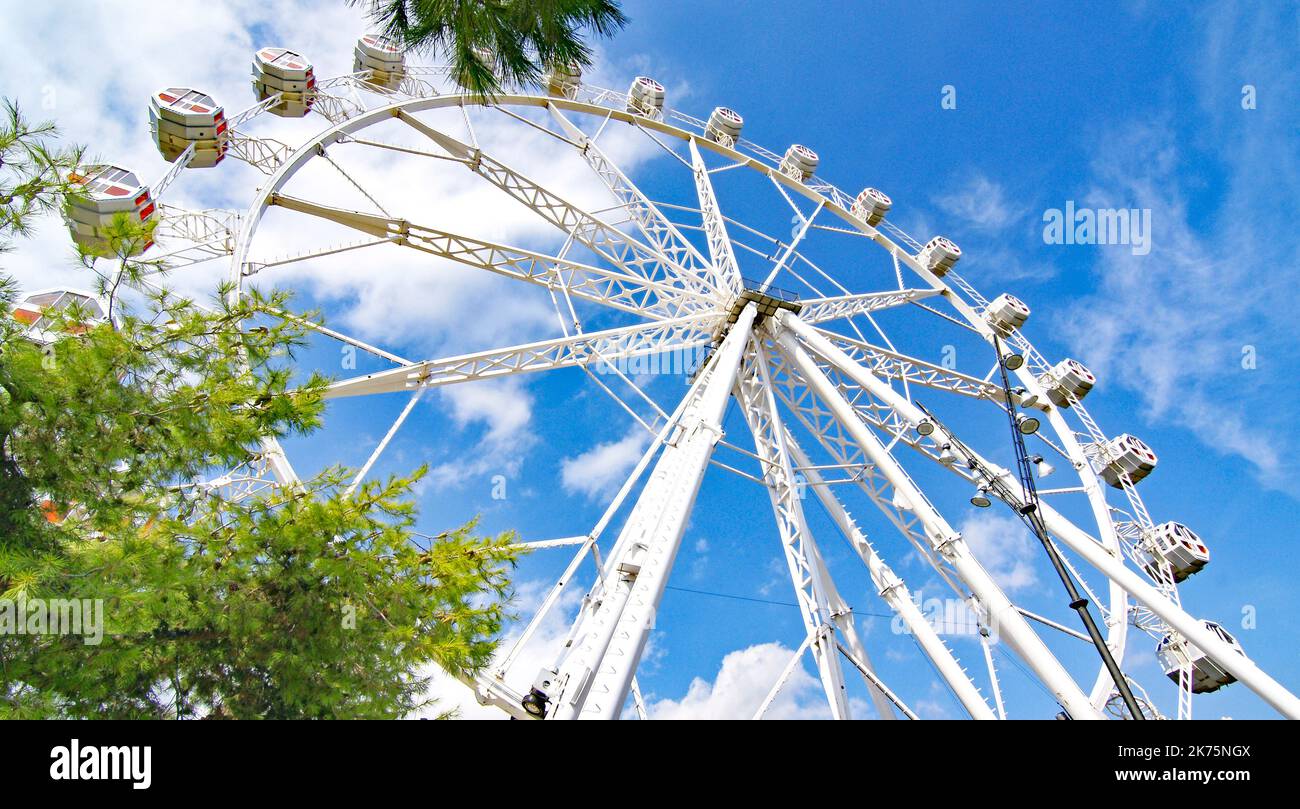 Ferris wheel at a fair in the Barceloneta neighborhood in Barcelona ...