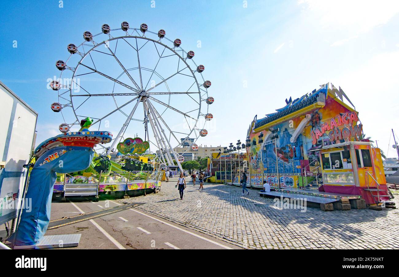 Ferris wheel at a fair in the Barceloneta neighborhood in Barcelona ...