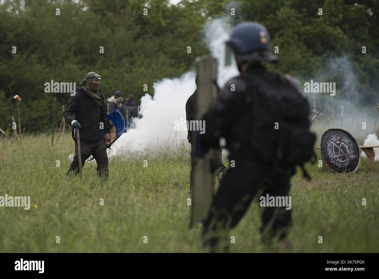 Police continued to clear activists on Tuesday from the decade-old camp ...