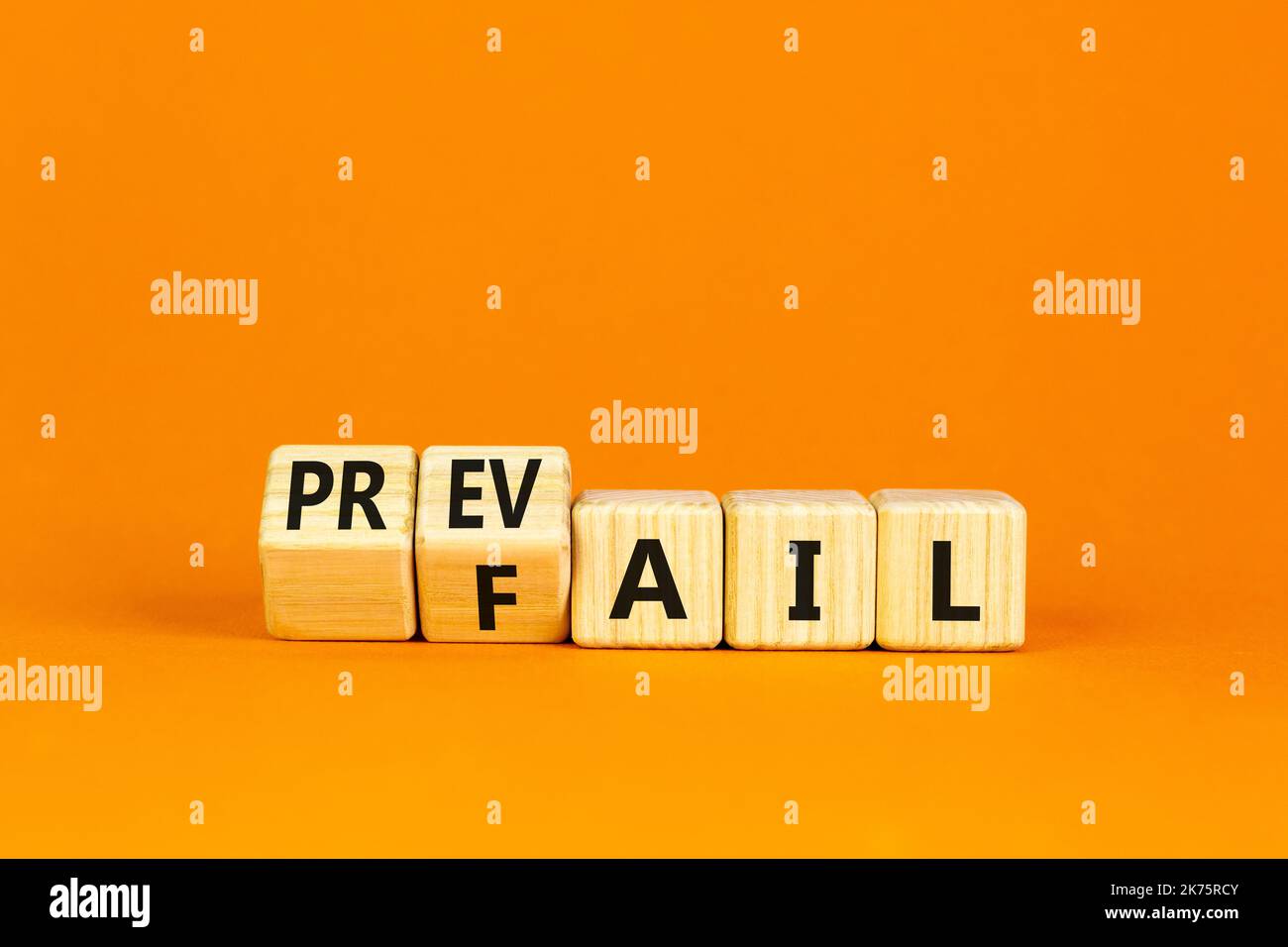 Prevail or fail symbol. Concept words Prevail or Fail on wooden cubes ...