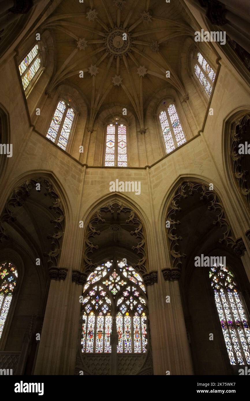 Architectural details and stained glass windows in the interior of the ...