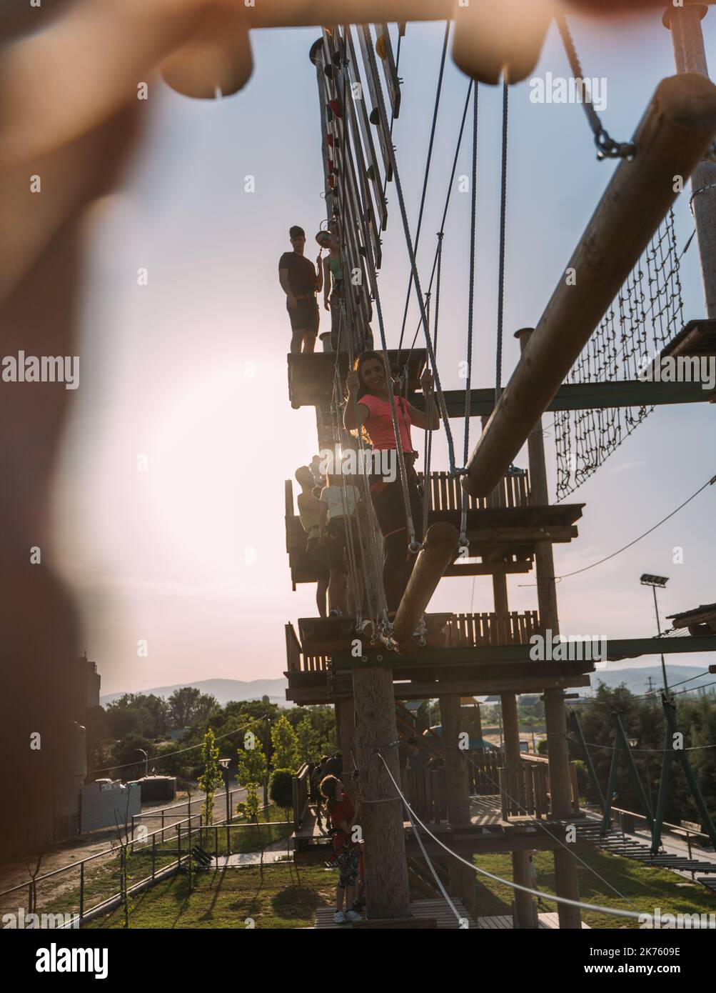Group of adventure people climbing at the adventure park Stock Photo ...