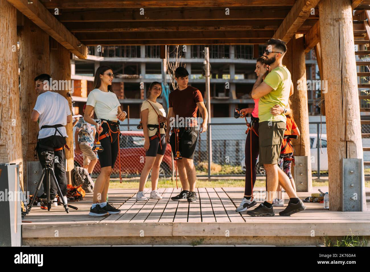 Group of amazing people standing in the adventure park Stock Photo - Alamy