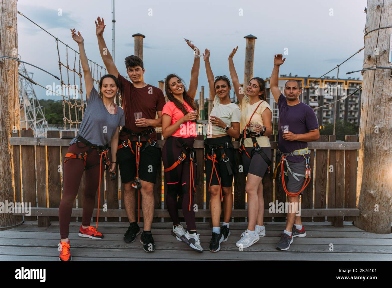 Group of rock climbers taking a photo and laughing whilst staning on ...