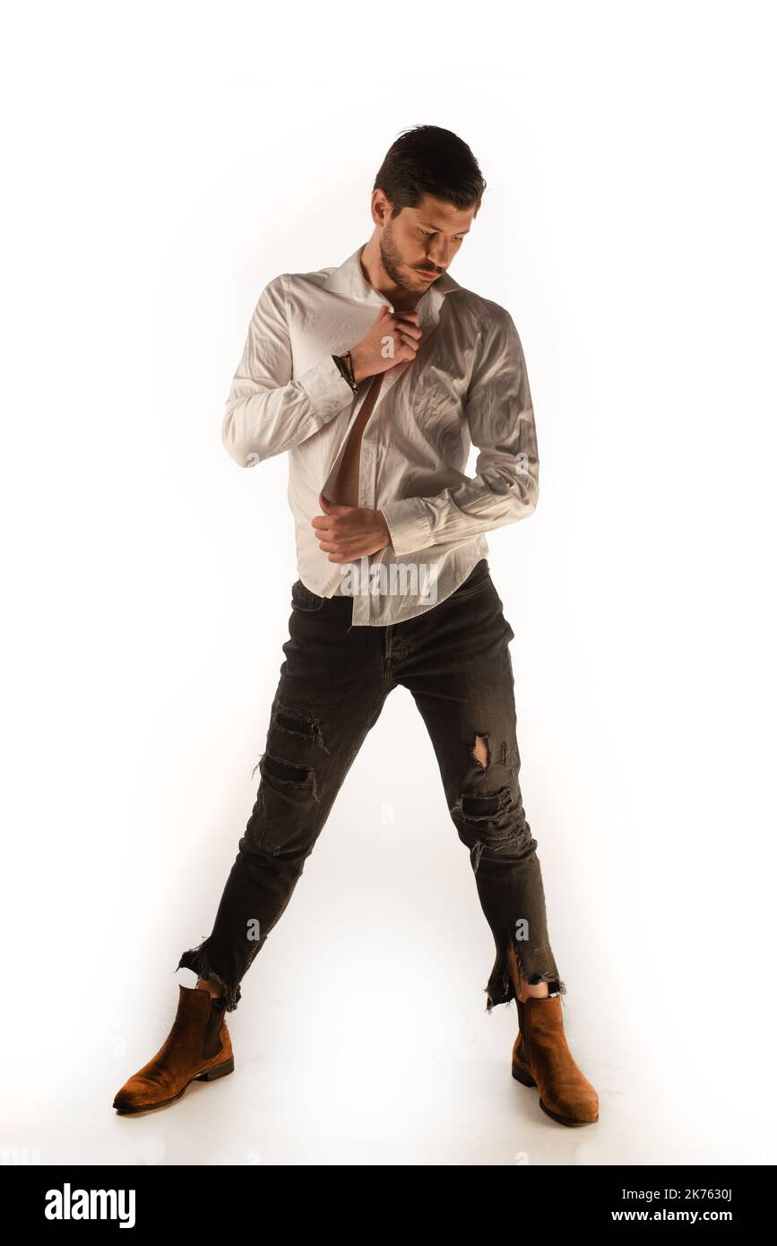 Adult fashion model doing seductive poses in the studio Stock Photo - Alamy