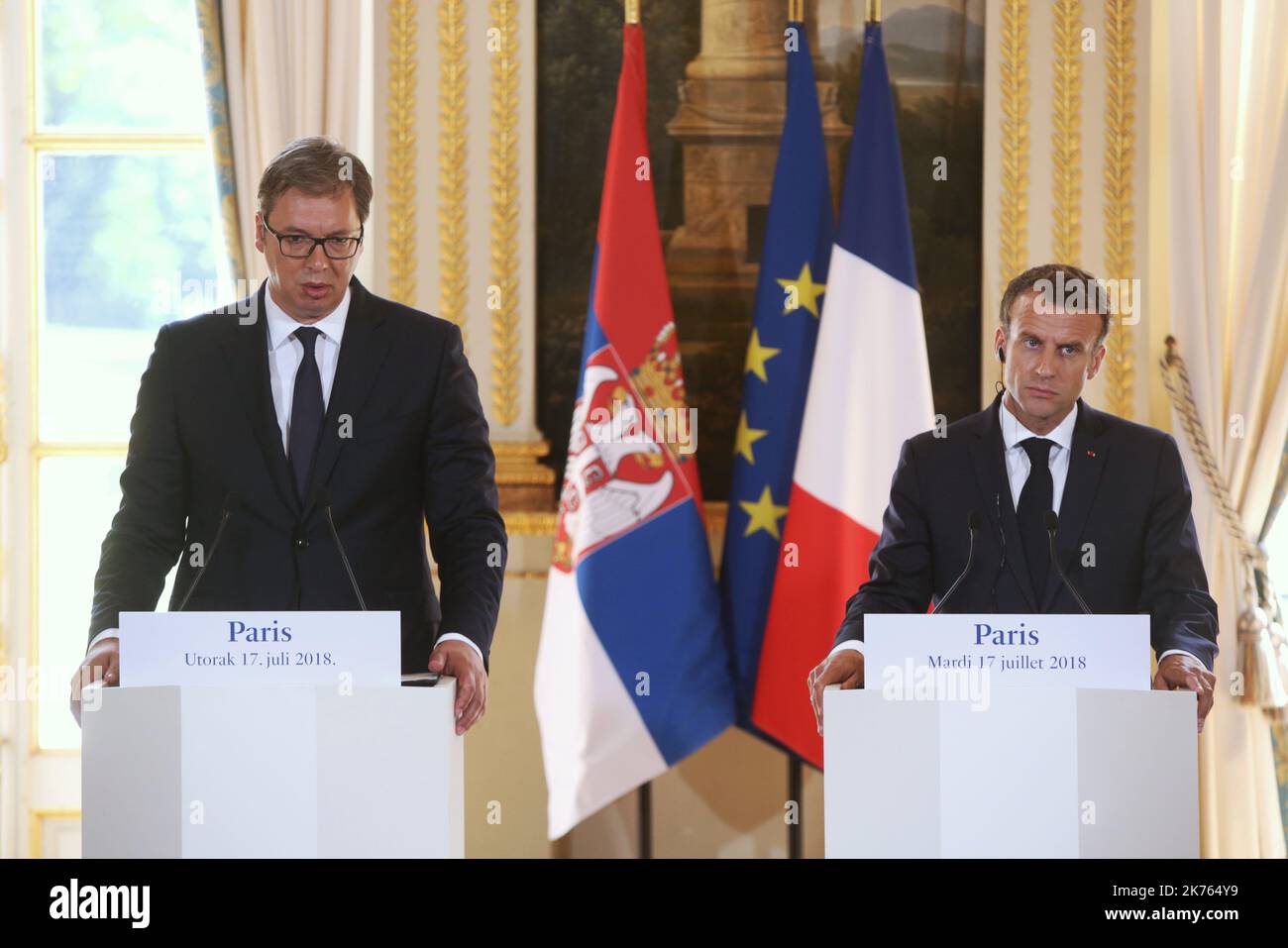 French President Emmanuel Macron (R) and his Serbian counterpart ...