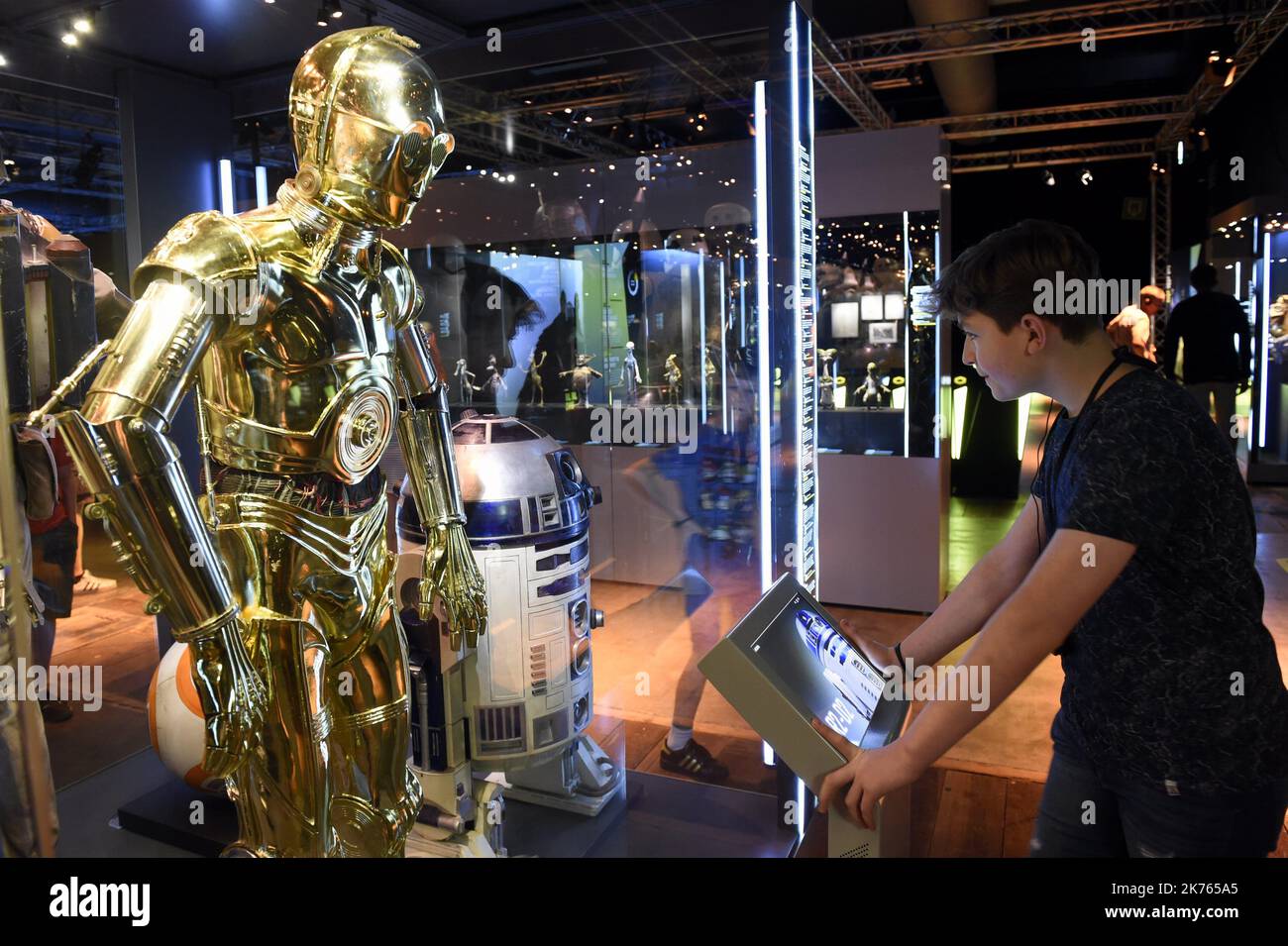 Costumes of the droids C-3PO and R2-D2 in the Star Wars Identities ...