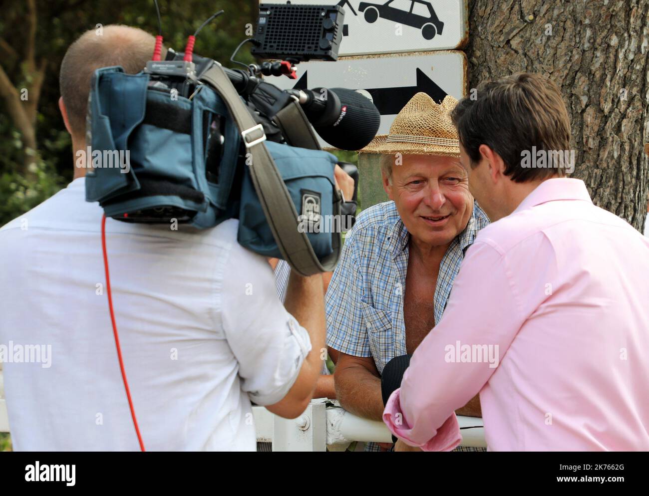 French President Emmanuel Macron arrives at his summer official ...