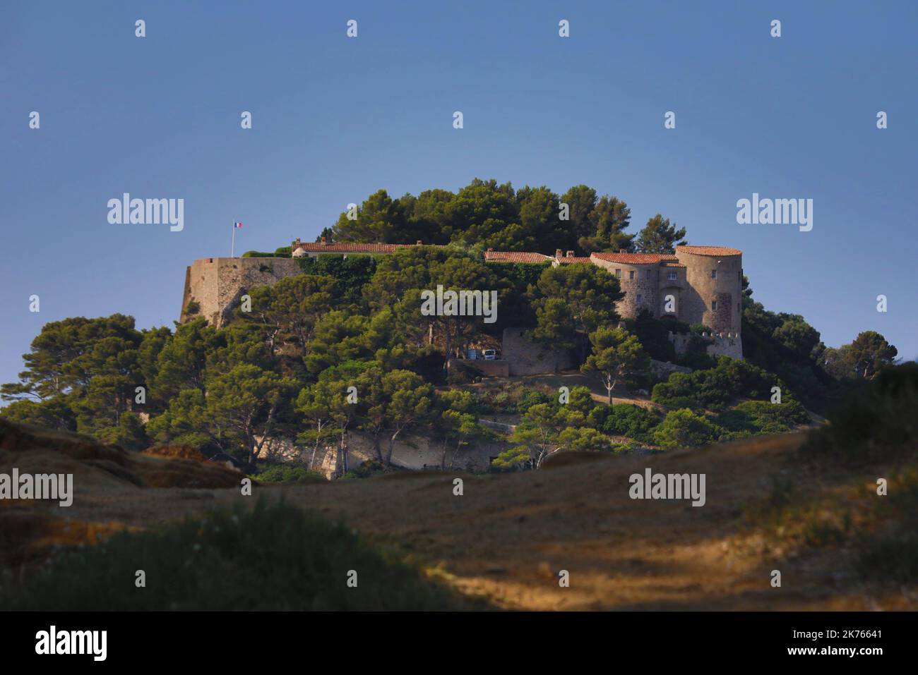 French President Emmanuel Macron arrives at his summer official ...