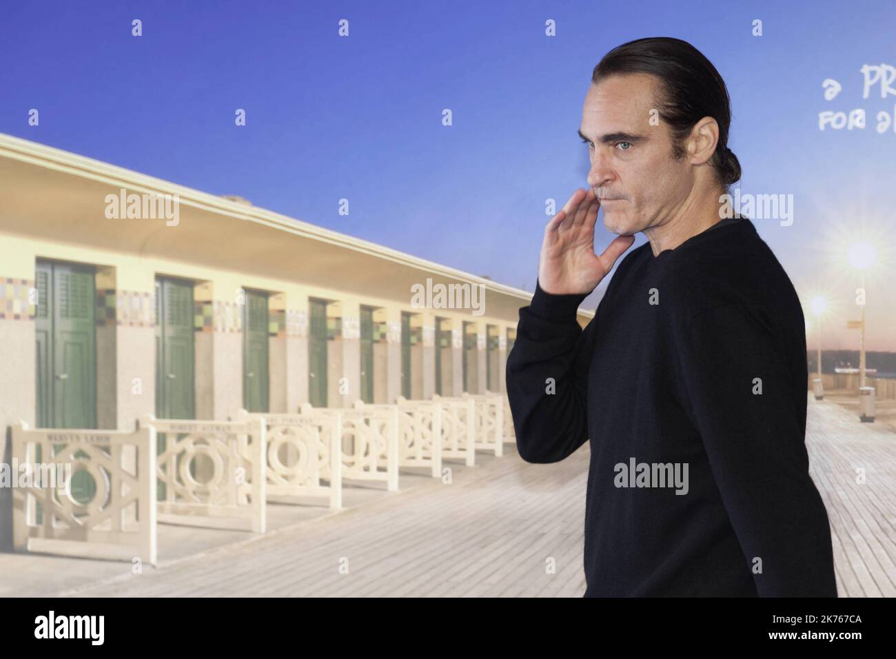 Joaquin Phoenix attending a photocall for the movie The Sisters ...