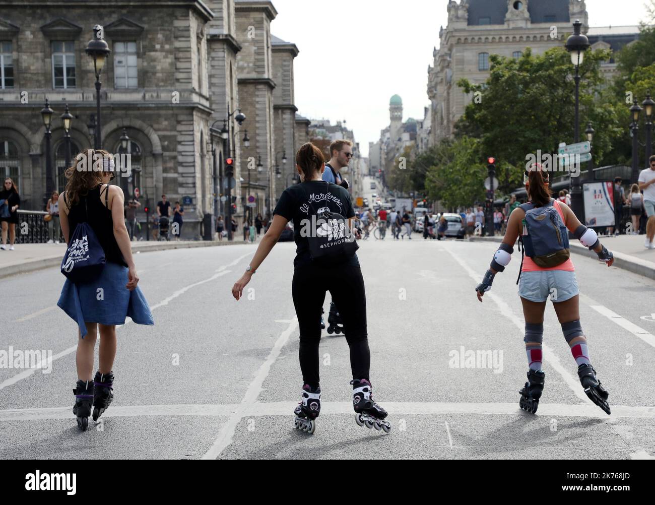 A general view of people walking/cycling during a car free day in Paris ...