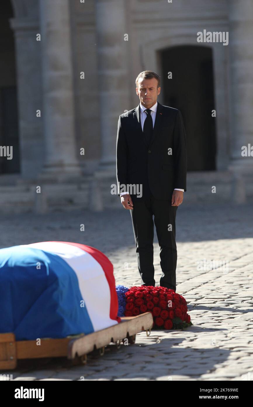 French President Emmanuel Macron pays his respects whilst attending the ...