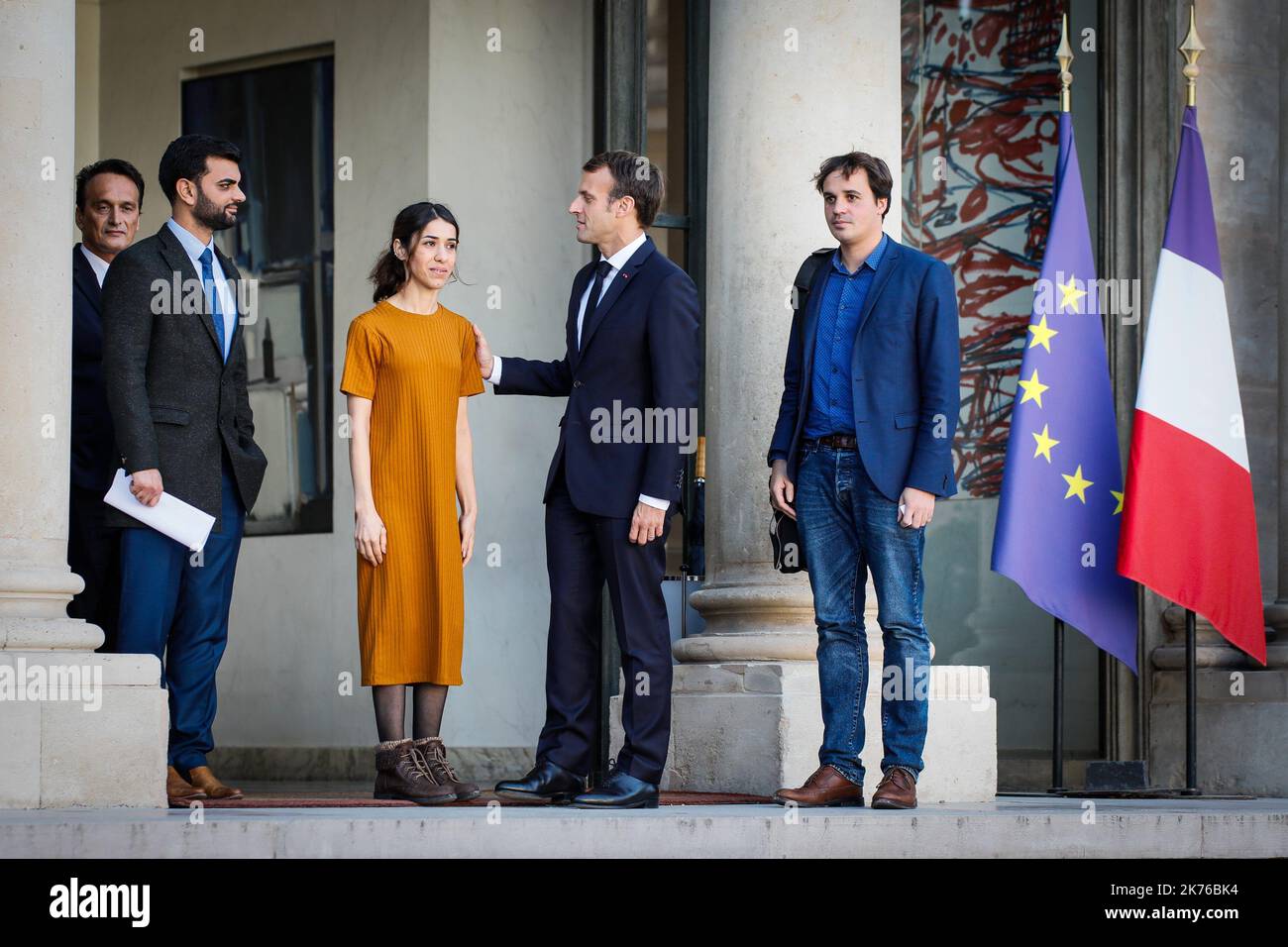 French President, Emmanuel Macron receives a co-recipient of this year ...