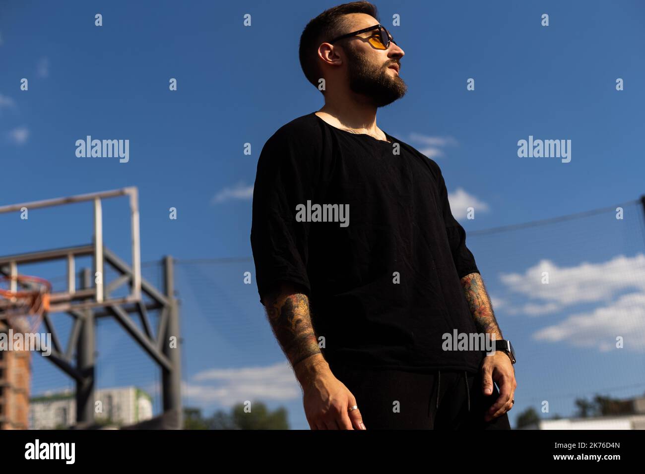 Young hispanic man smiling happy standing at the city Stock Photo - Alamy