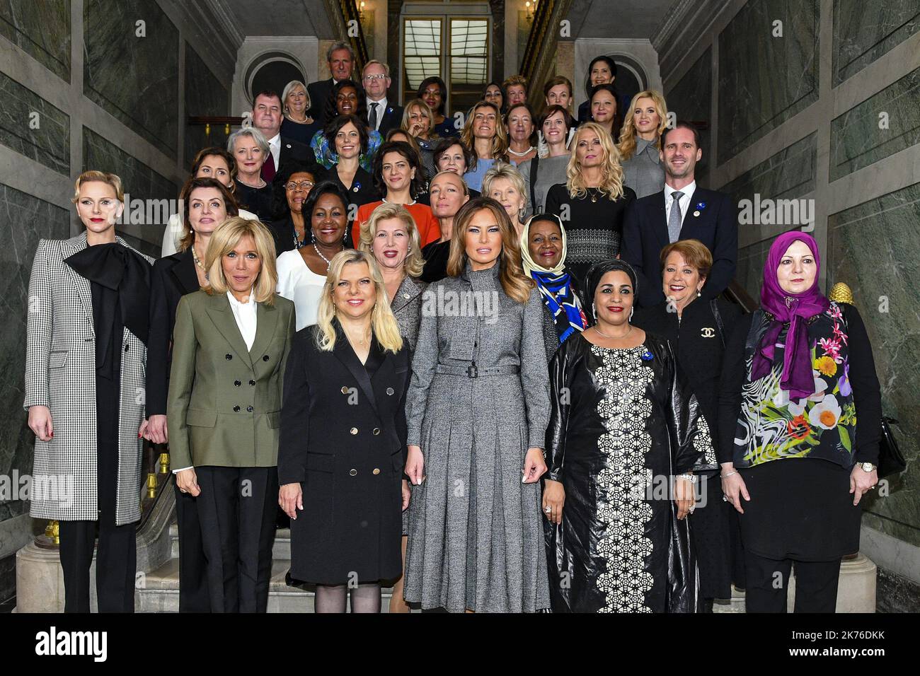 French President's wife Brigitte Macron poses with head of states ...