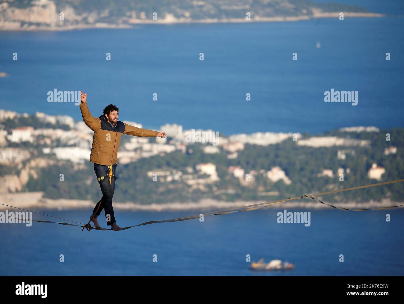 Slackline tightrope walker at La Turbie above Monaco Stock Photo - Alamy