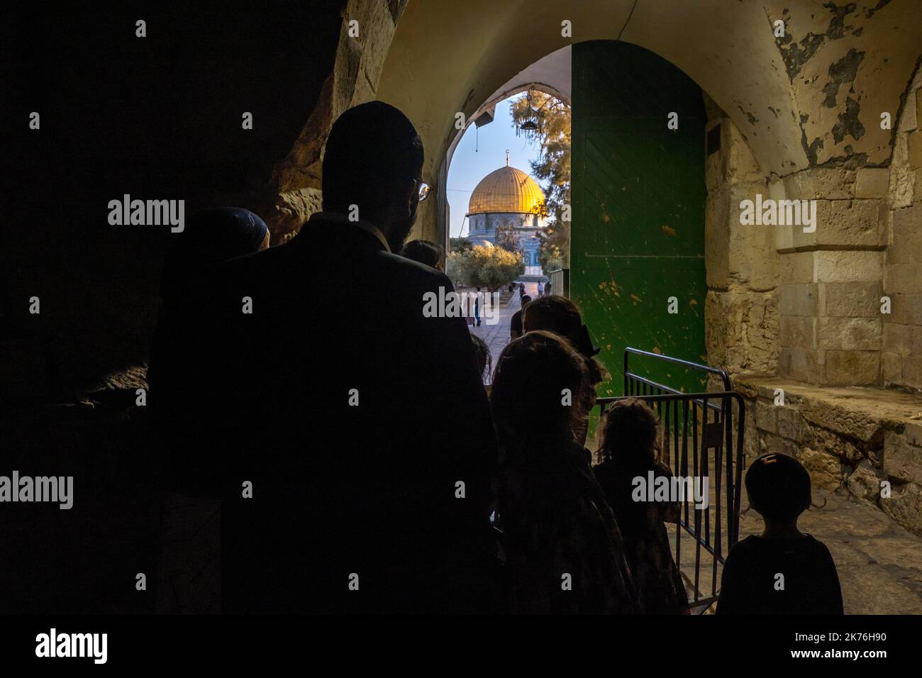 An Ultra Orthodox Jewish family loo at Dome of the Rock as they stand ...