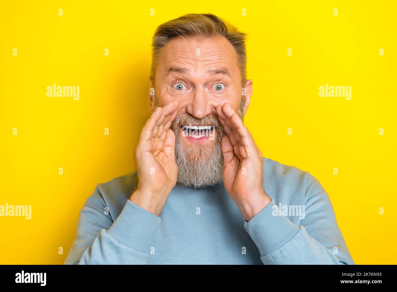 Photo of funky excited retired guy wear blue sweater arms mouth making ...