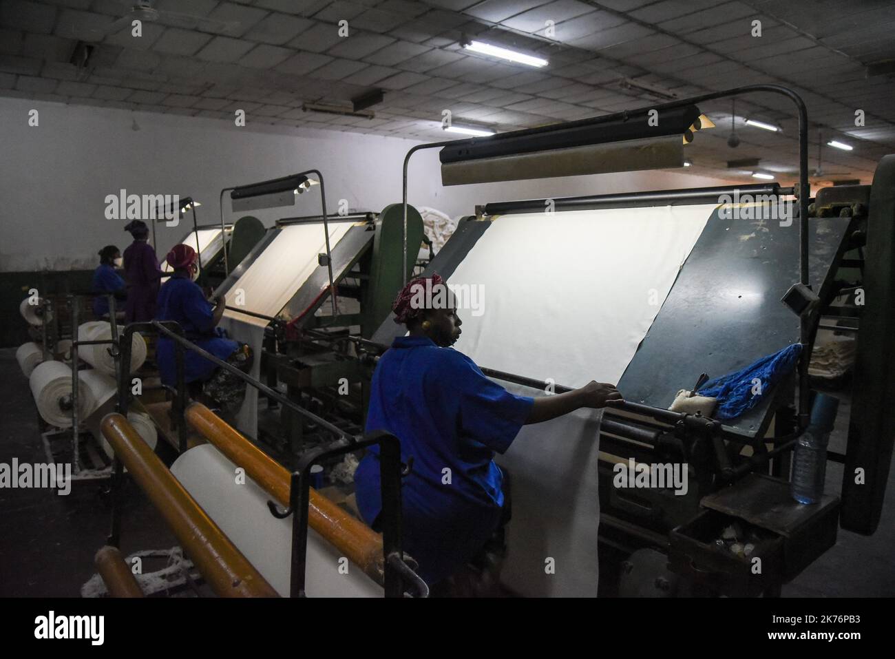 A worker from the COMATEX plant in Segou is monitoring a cotton winding ...