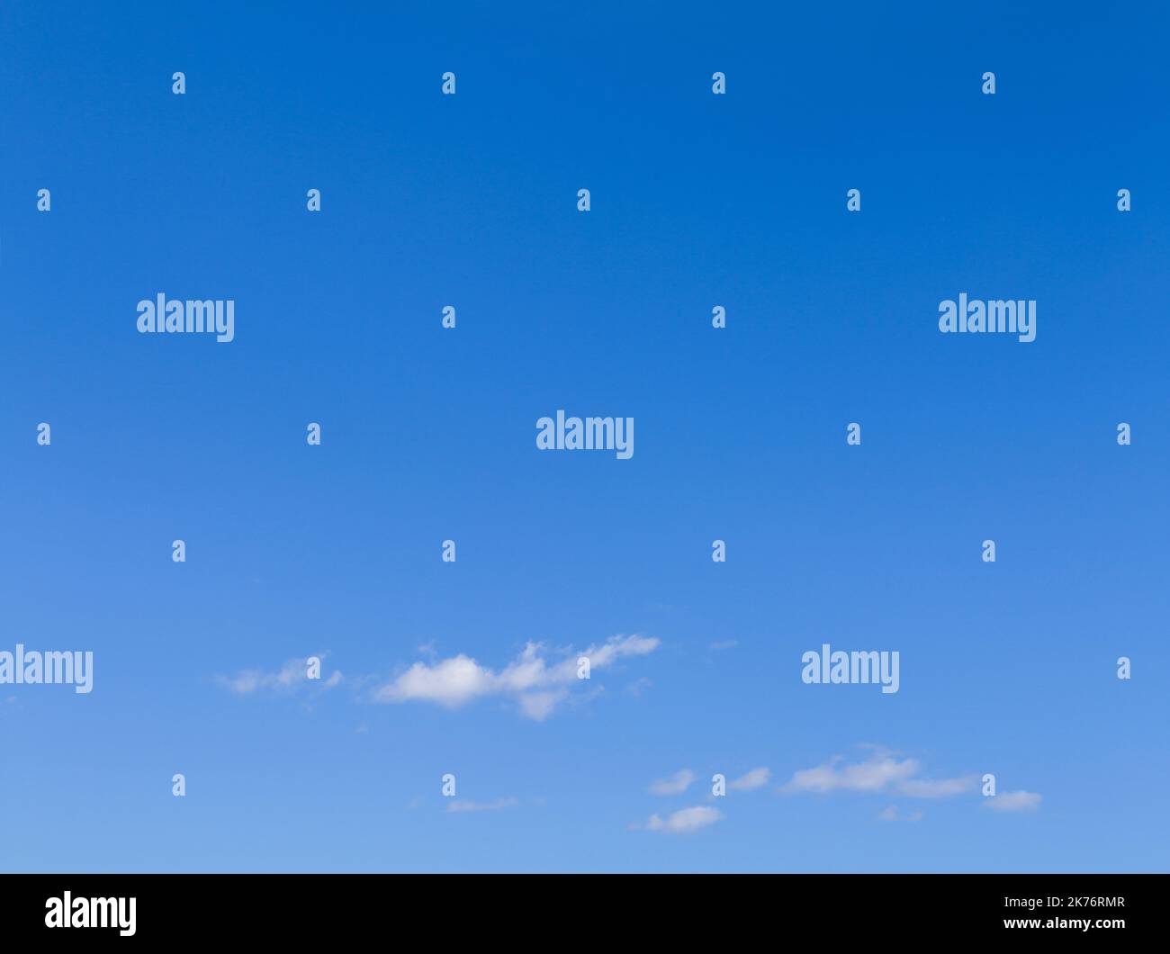 Big blue sky with little white clouds in summer Stock Photo - Alamy