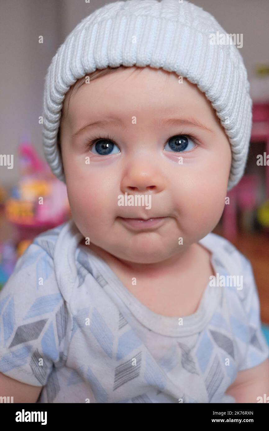 Portrait of a cute baby just a few months old Stock Photo - Alamy