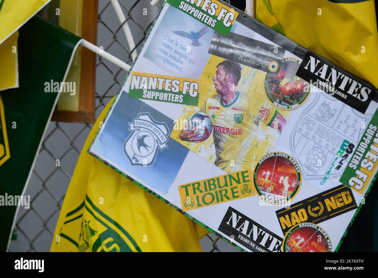 Tribute to Emiliano Sala, Nantes. Flowers are placed with images from ...