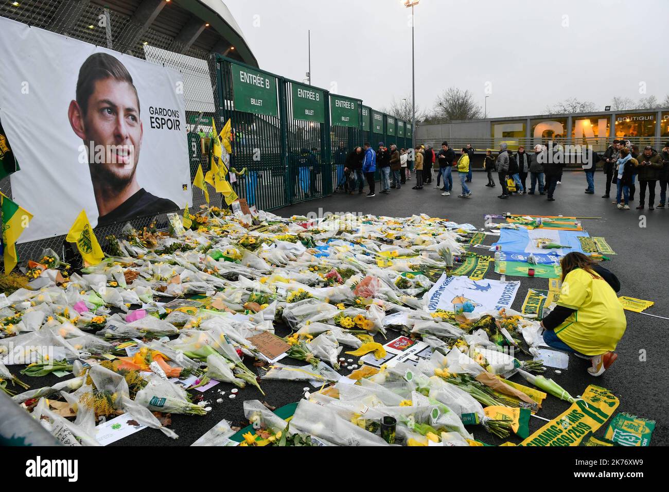 Tribute to Emiliano Sala, Nantes. Flowers are placed with images from ...