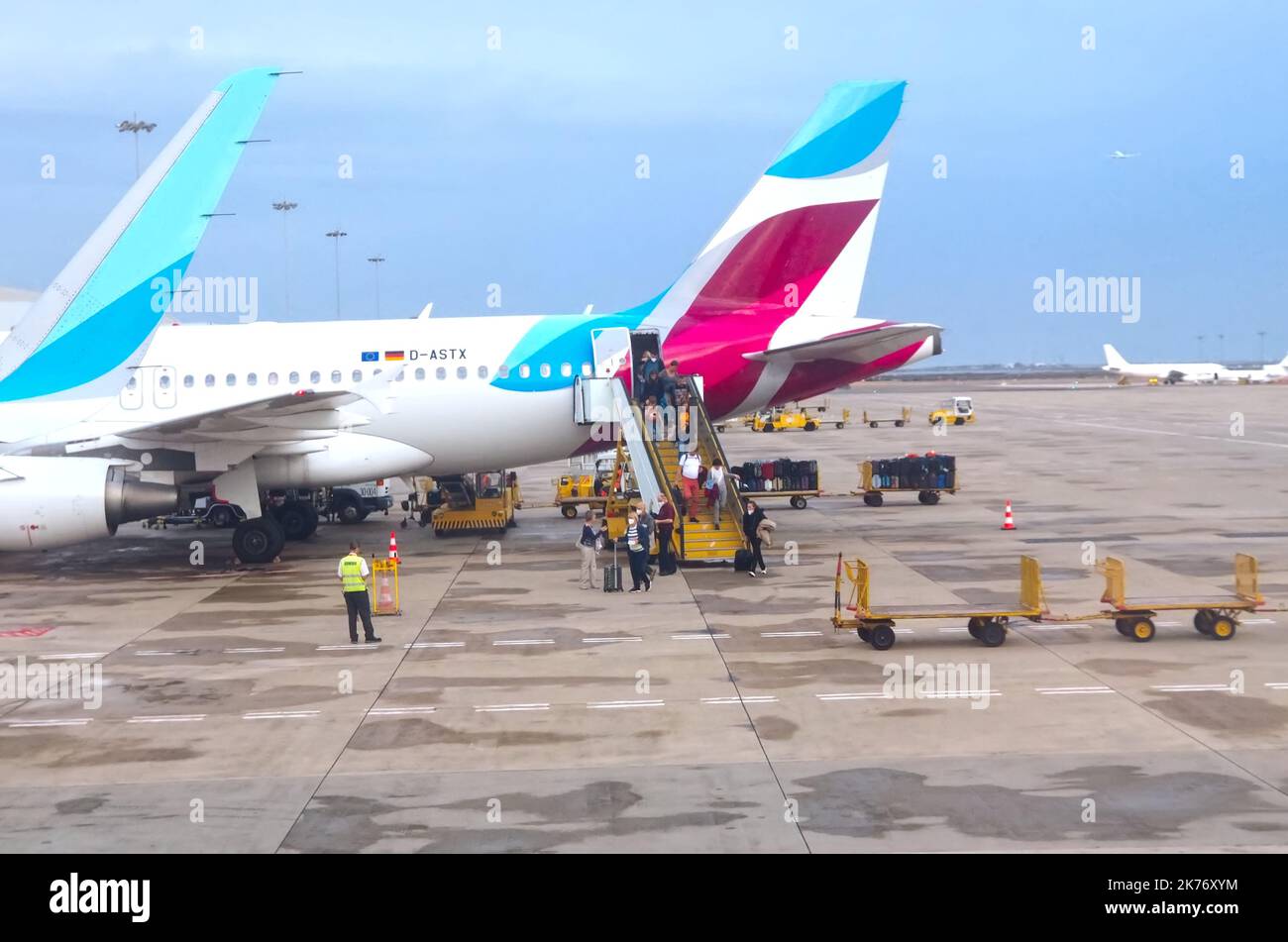 Eurowings Airplane with people Stock Photo - Alamy