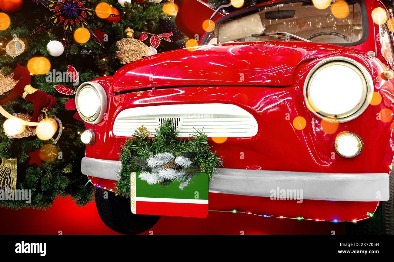 New Year's red car with the flag of Chechen Republic against the ...