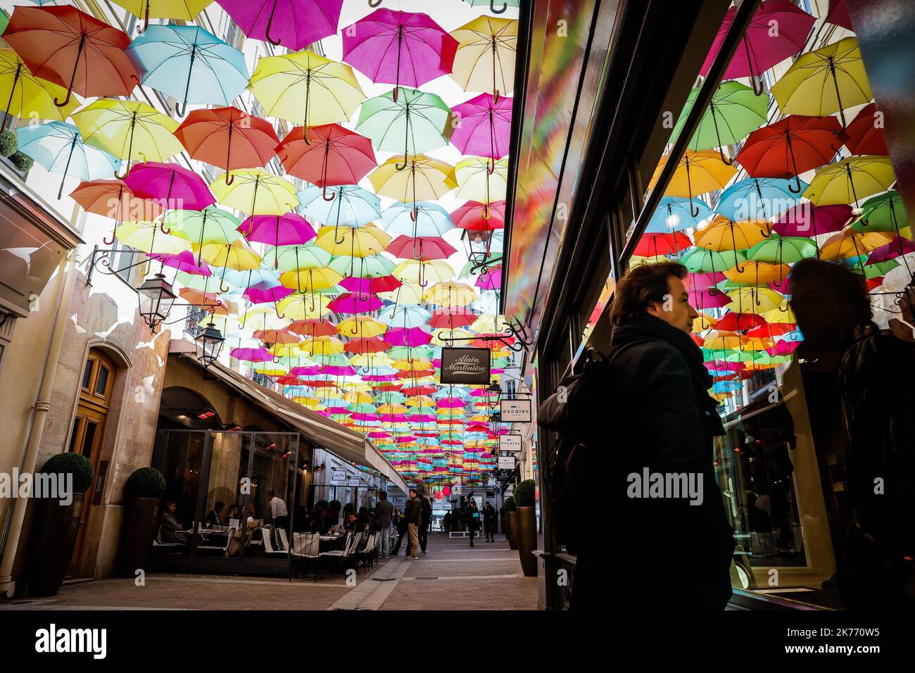 Sky of colorful umbrellas installed at Le Village Royal in Paris Stock ...