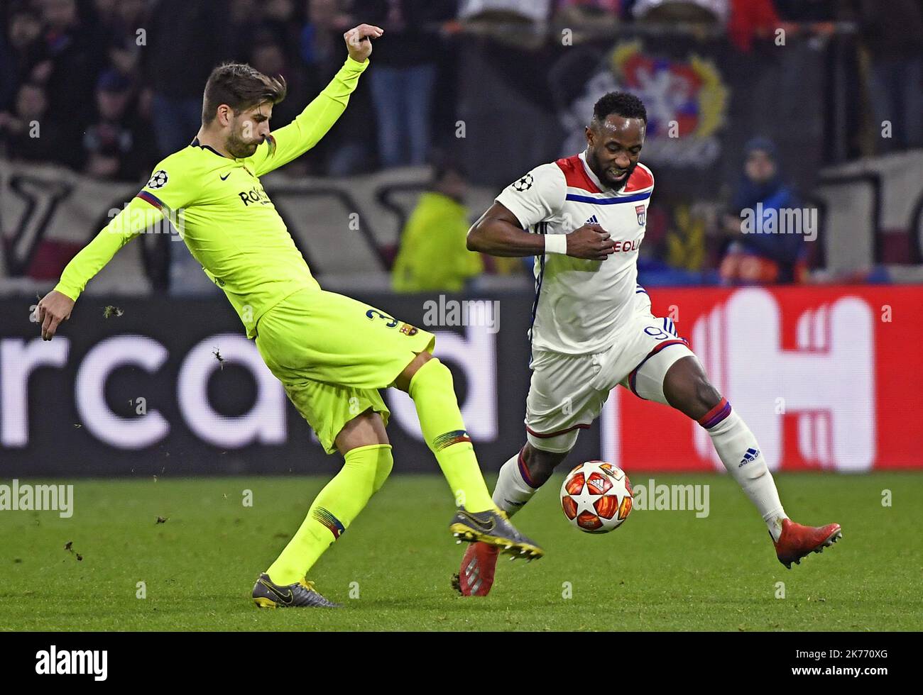 MOUSSA DEMBELE ET GERARD PIQUE. Lyon v Barcelona - UEFA Champions ...