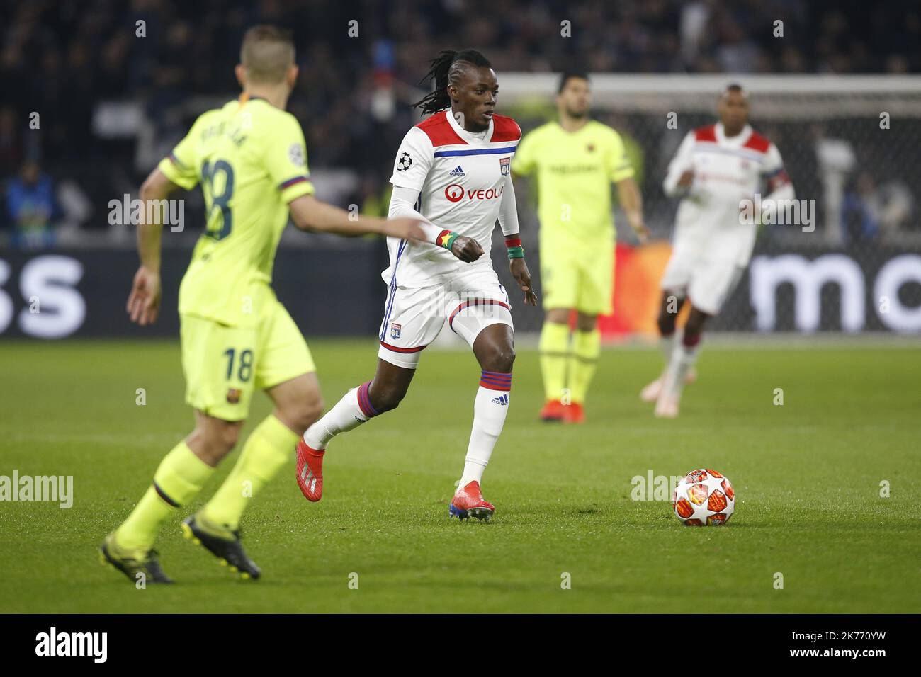 Bertrand Traore of Olympique Lyonnais runs with the ball during the ...