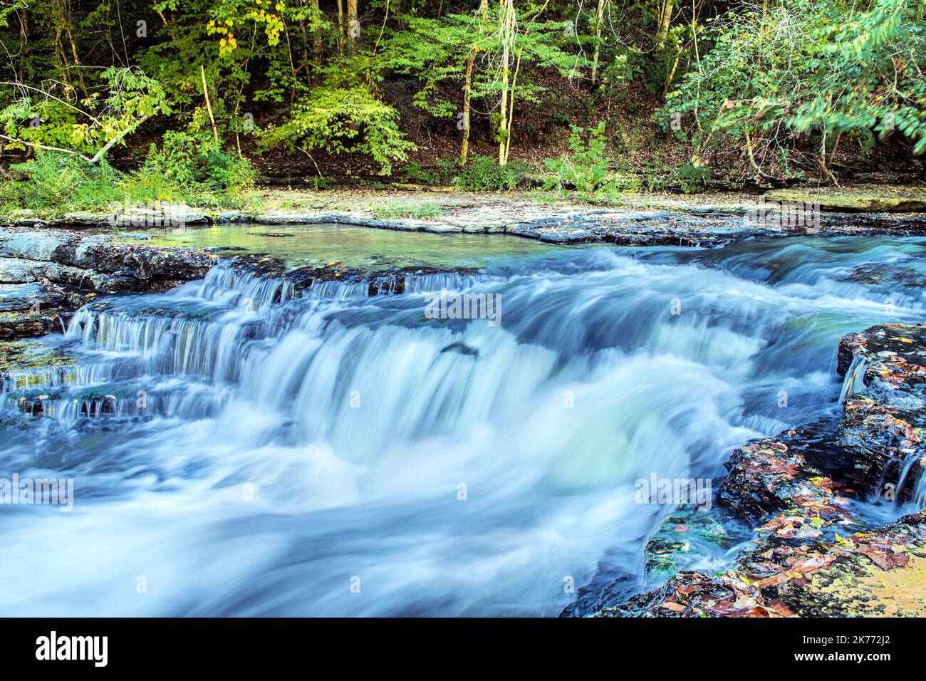A stunningly beautiful stepped waterfall shot with a slow shutter speed ...