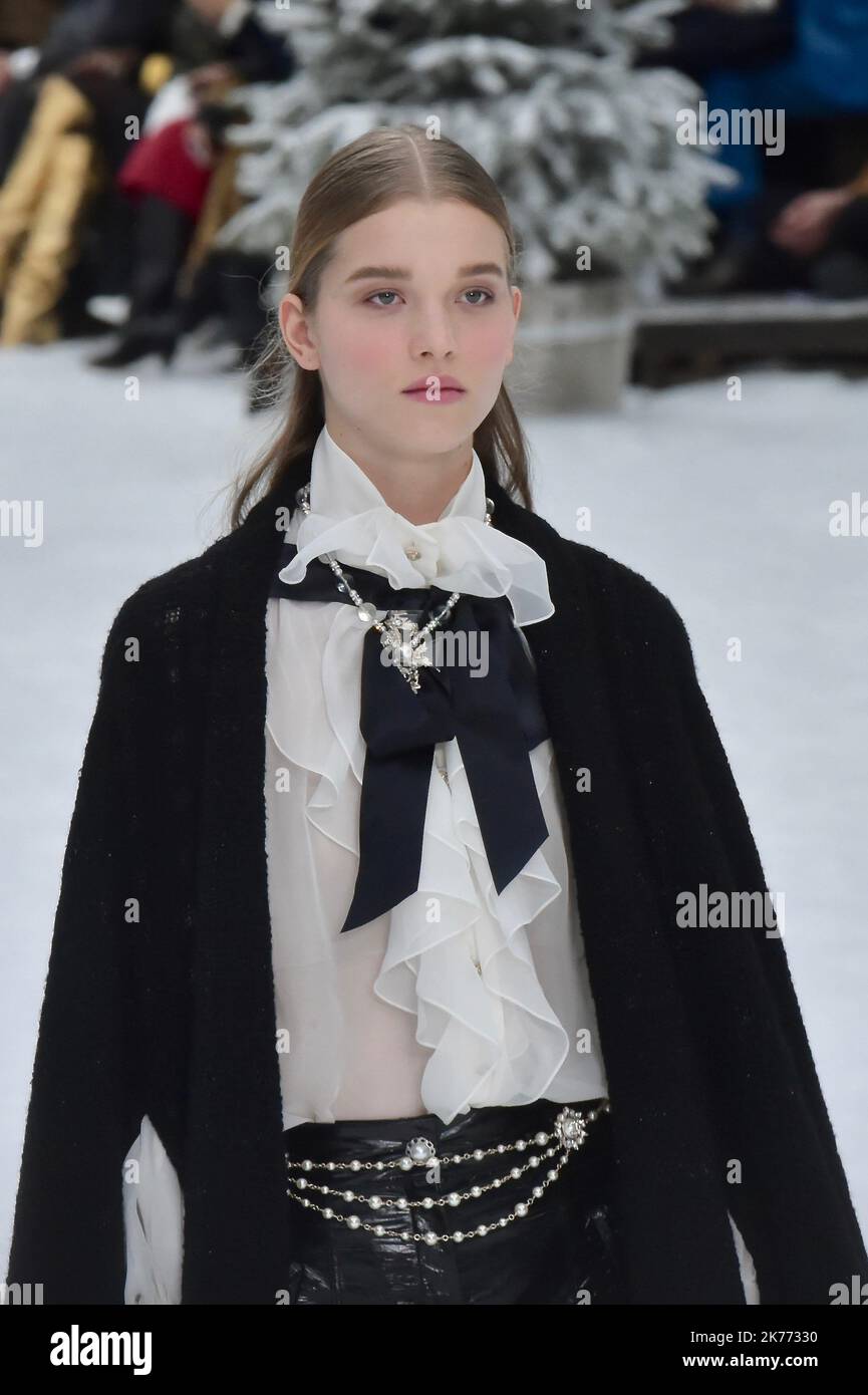 Models walk the runway during the Chanel show as part of the Paris ...
