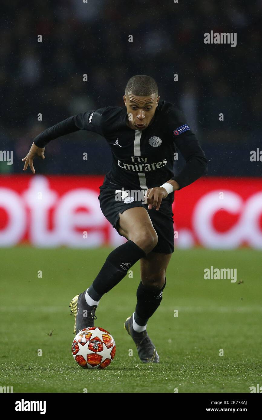 Kylian Mbappe of Paris Saint-Germain runs with the ball during the UEFA ...