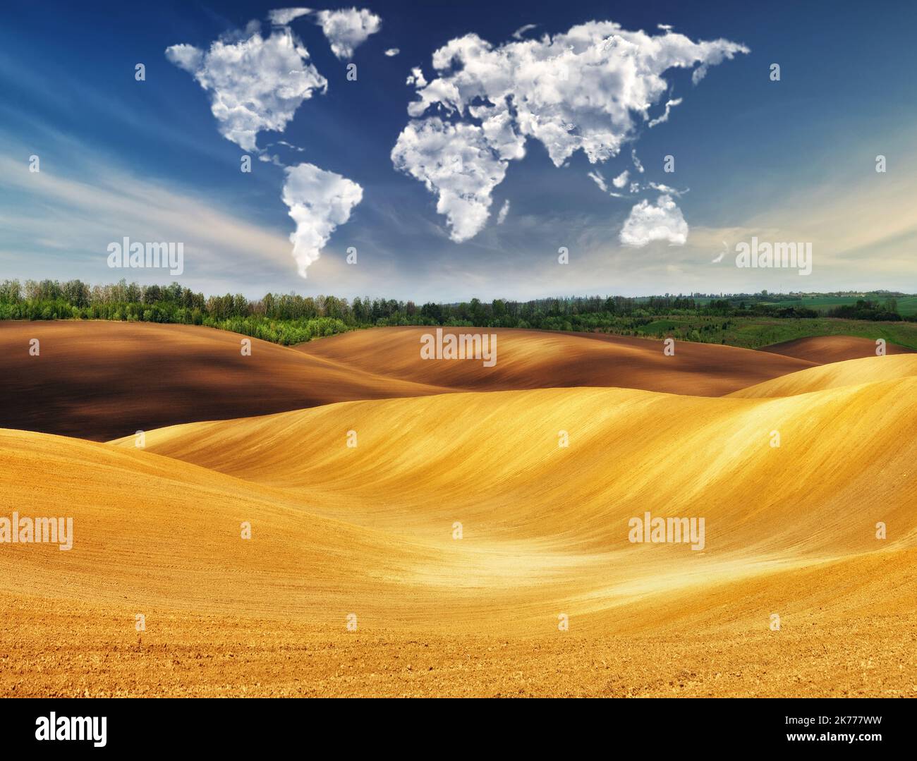 clouds in the form of a map of the world over the field. Travel and ...
