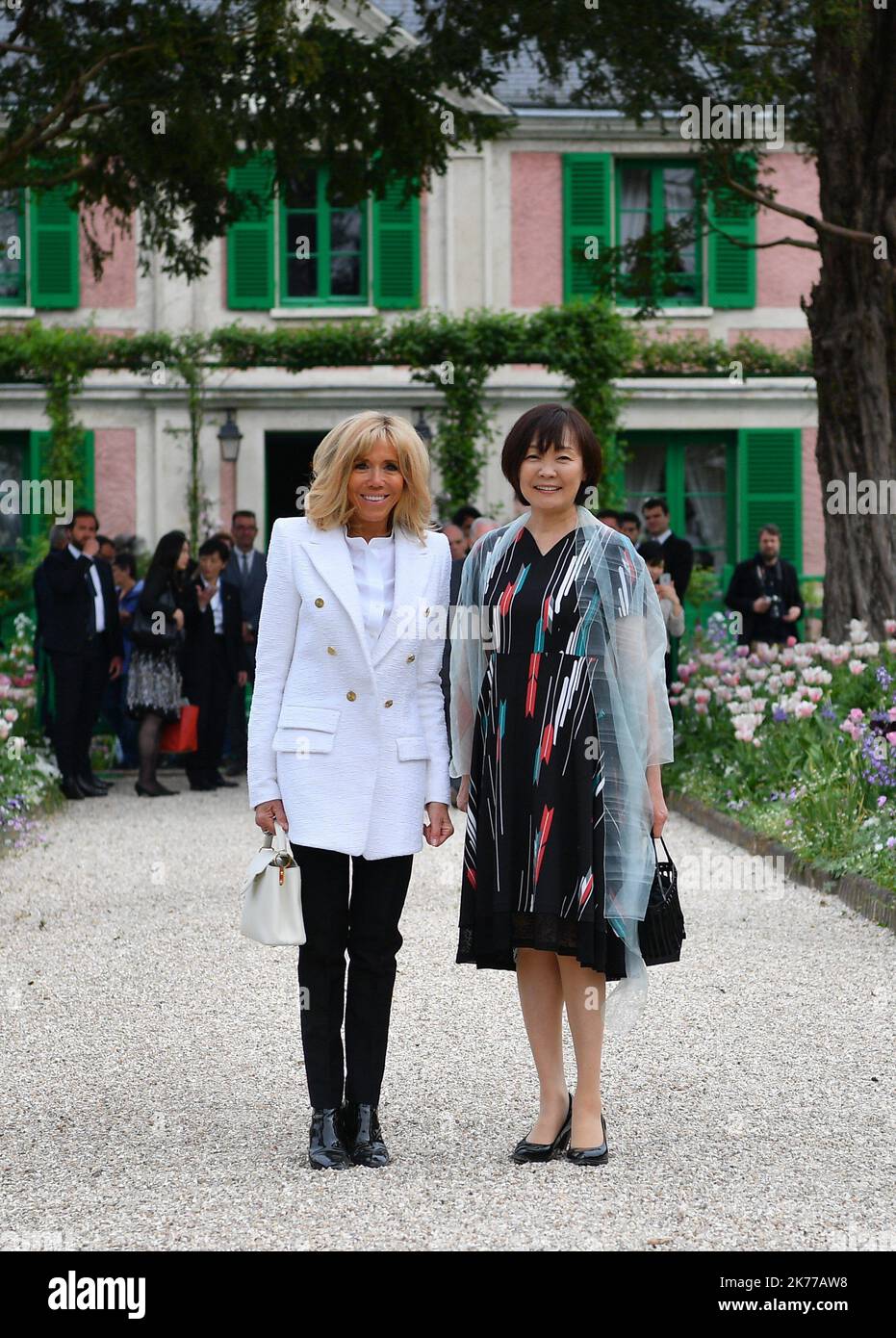 French First Lady Brigitte Macron (left) and wife of Japan's Prime ...