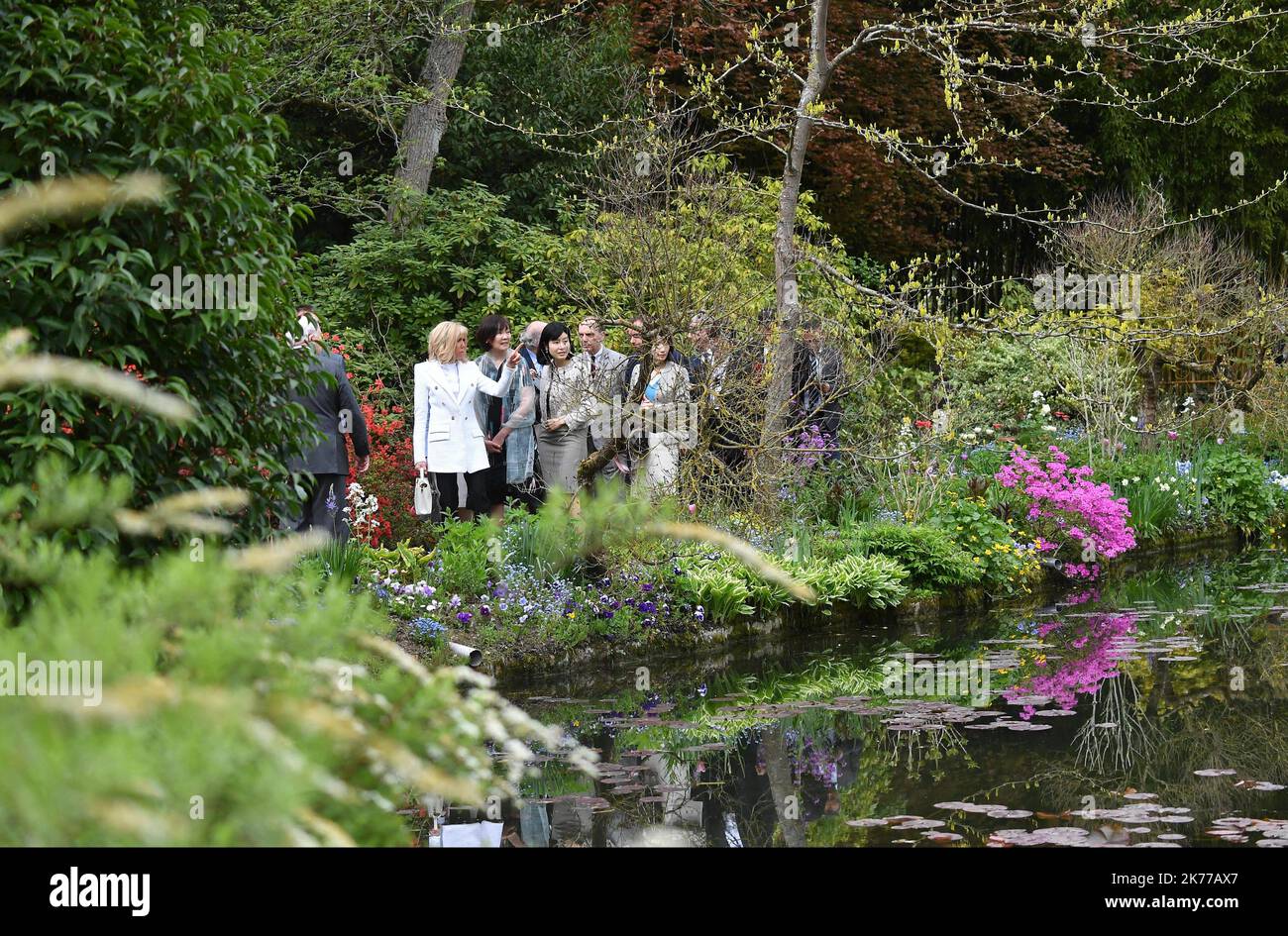 French First Lady Brigitte Macron (left) and wife of Japan's Prime ...