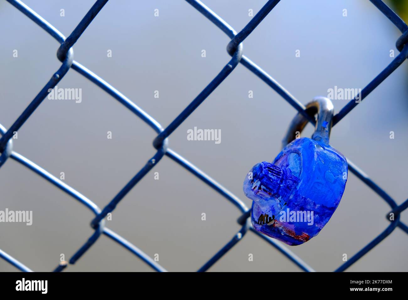 Lock on chainlink chain link fence representing commitment to love ...