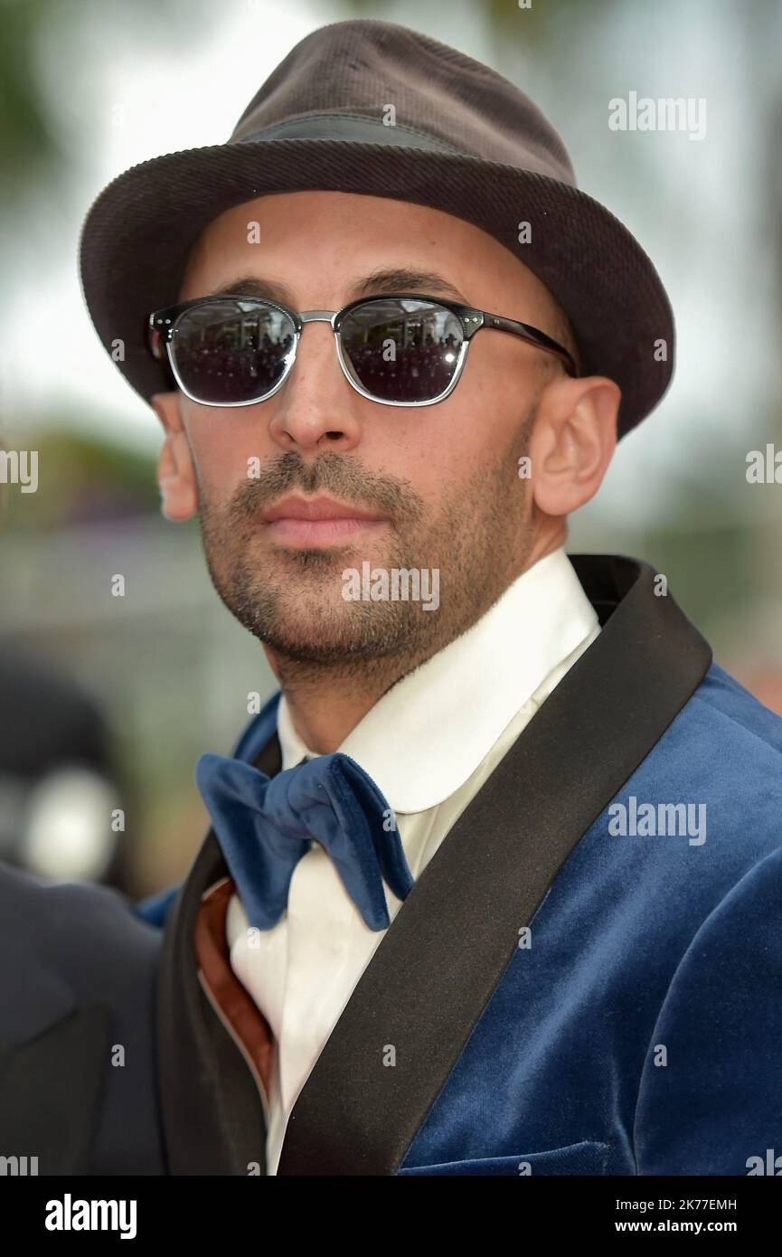 French photographer JR attends the screening of Les Miserables during ...