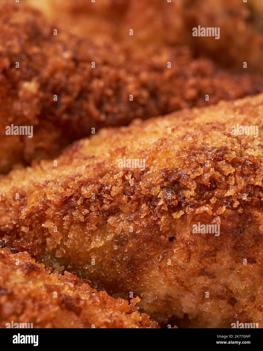 Home made breaded baked chicken legs Stock Photo - Alamy
