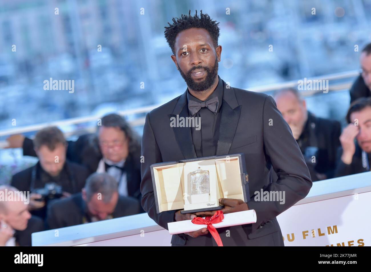 Director Ladj Ly speaks after receiving the Jury Prize at the Closing ...